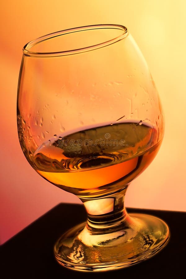 Snifter with cognac stock image. Image of brown, beverage - 20524113