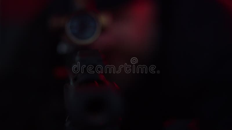 Sniper Looking through Scope on Rifle. Violent Man Making Shot from ...