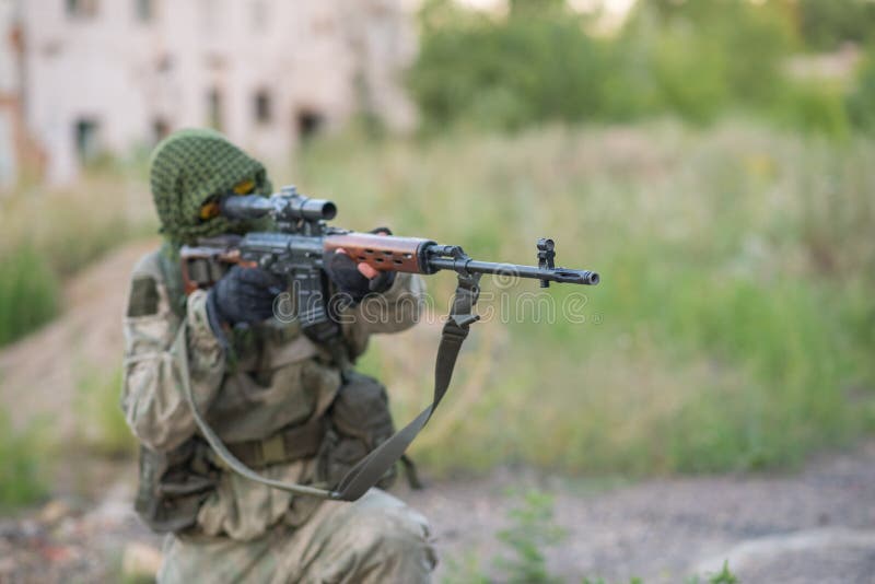 Sniper with Rifle Posing. Airsoft Game. Stock Image - Image of ...
