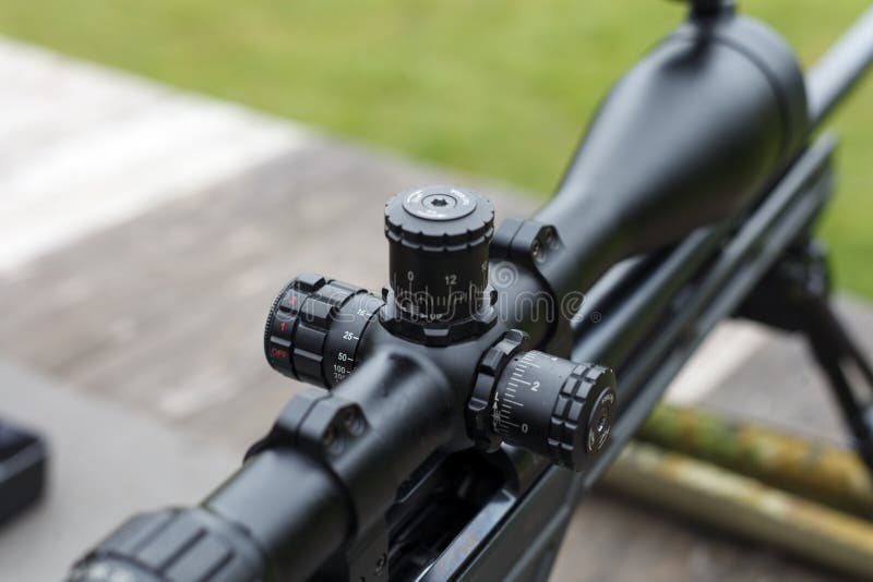 Sniper Rifle on a Wooden Table in the Forest. Horizontal Photo. Stock ...