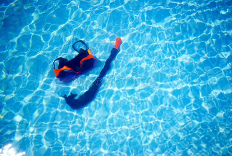 Snorkel mask in the pool stock image. Image of poolside - 10887461