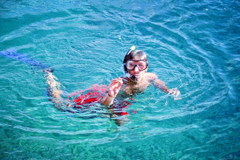 Snorkeling man in the sea stock photo. Image of healthy - 120285110