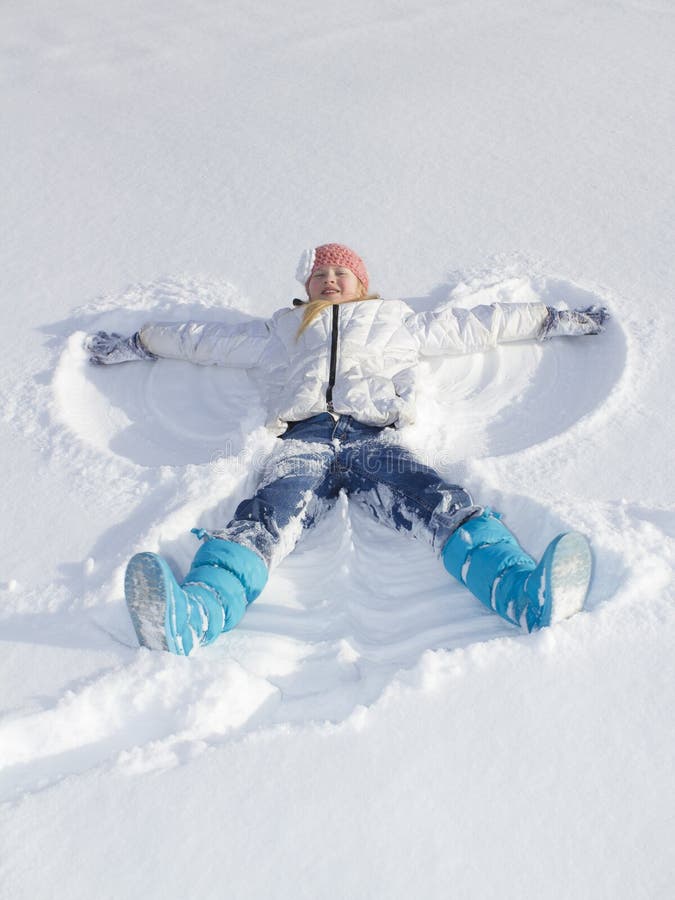 Snow angel stock image. Image of childhood, vertical - 23816151