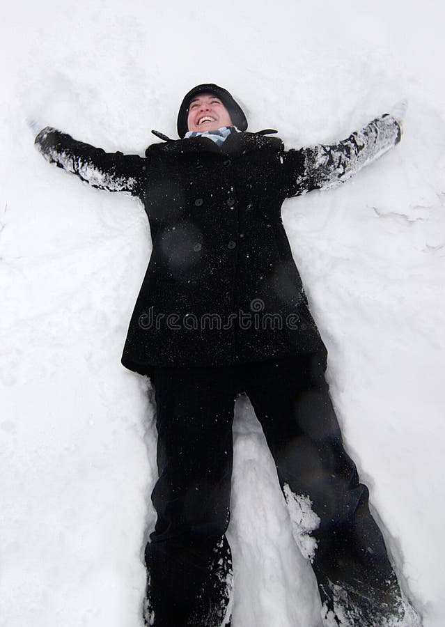 Snow angel stock image. Image of lying, cheer, outside - 7364657