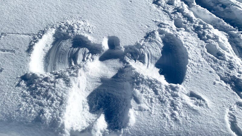 A Snow Angel is Made in the Snow Stock Image - Image of christmas ...