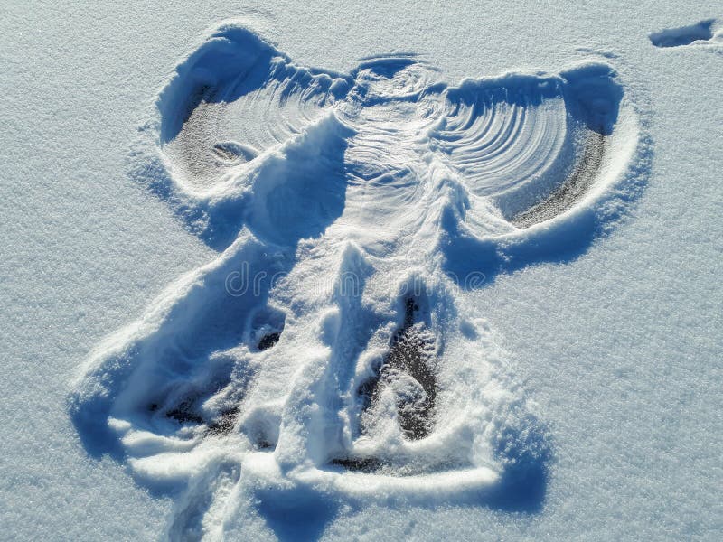 Snow angel in the snow stock image. Image of nature - 173201969