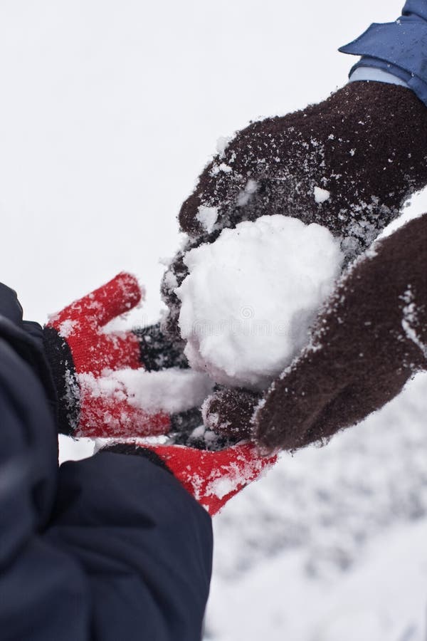 Snow ball fight stock image. Image of snowball, hand - 28117645