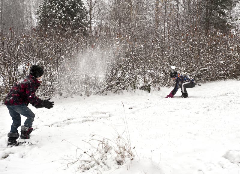 Snow ball fight stock image. Image of playful, ball, balls - 28030083