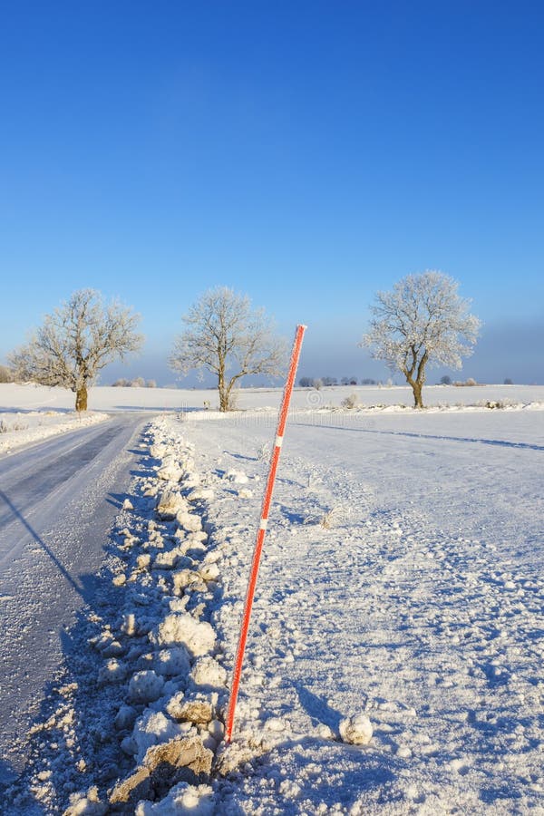 Snow Bank with a Stick at the Road Stock Photo - Image of hoarfrost ...