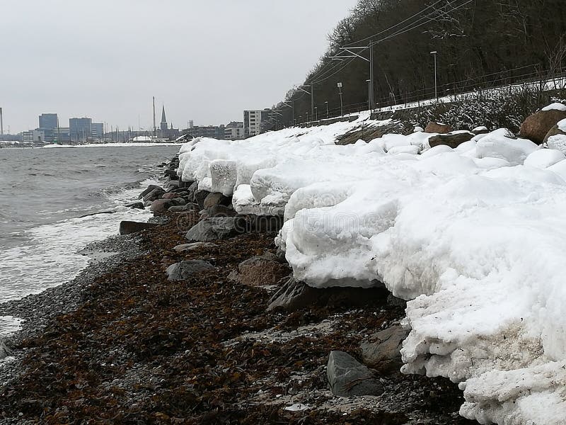 Snow beach stock image. Image of snowy, snow, ocean - 111803757