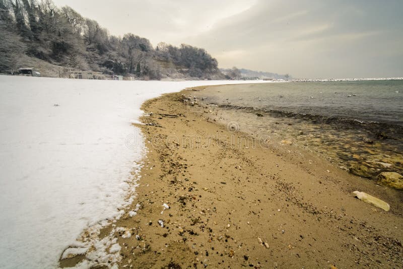 Snow in the beach stock image. Image of beach, black - 109012955