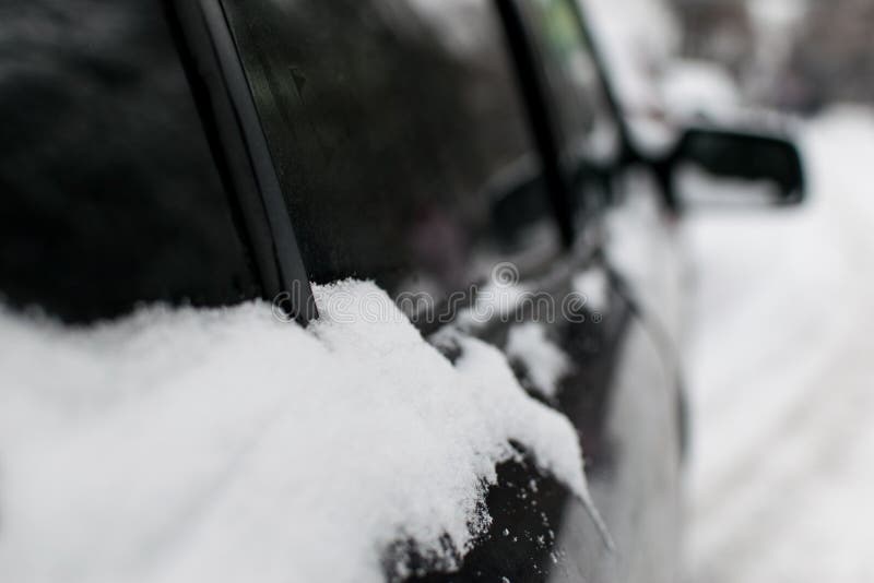 Snow on a black car stock photo. Image of climate, blizzard - 243316050