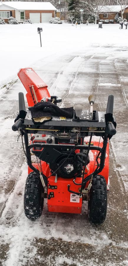 Snow Blower on Drive Way with Freshly Fallen Snow Stock Photo - Image ...