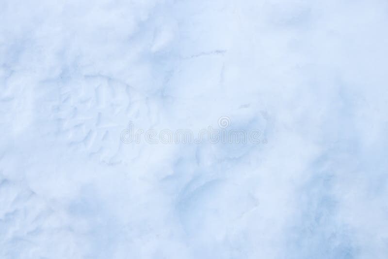 Snow boots tracks surface. stock photo. Image of snowy - 182757286