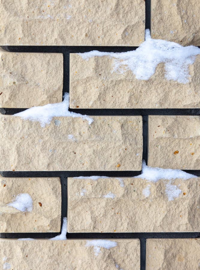 Snow on a Brick Wall in Winter. Stock Image - Image of surface, stones ...