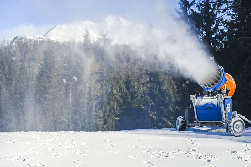 Snow Cannon in Winter Mountains. Snow-gun Spraying Artificial Ice ...