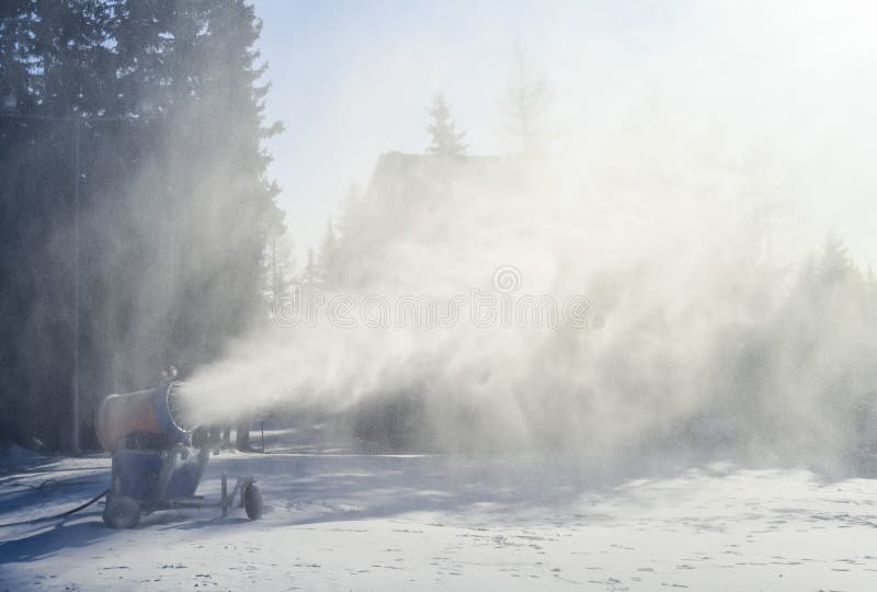 Snow Cannon in Winter Mountains. Snow-gun Spraying Artificial Ice ...