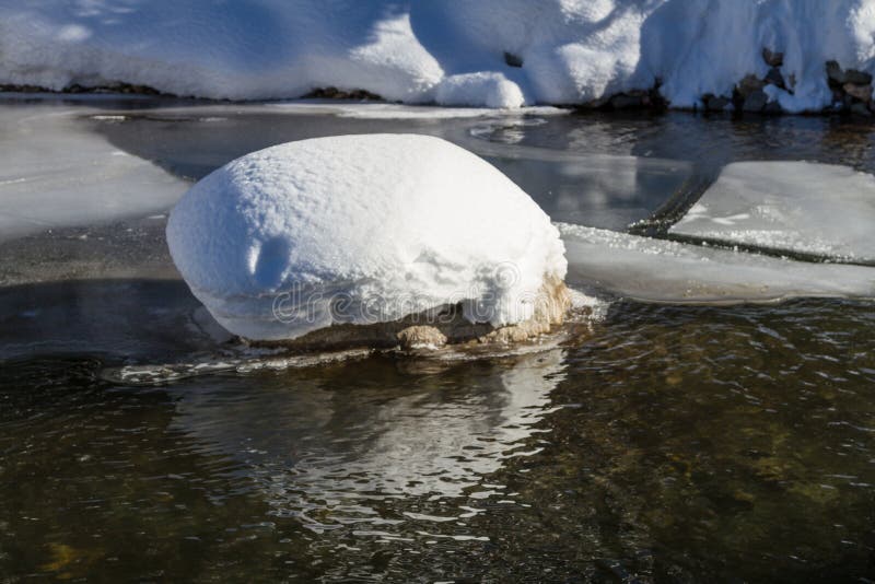 With snow cap stone stock photo. Image of snowfall, pool - 84676758
