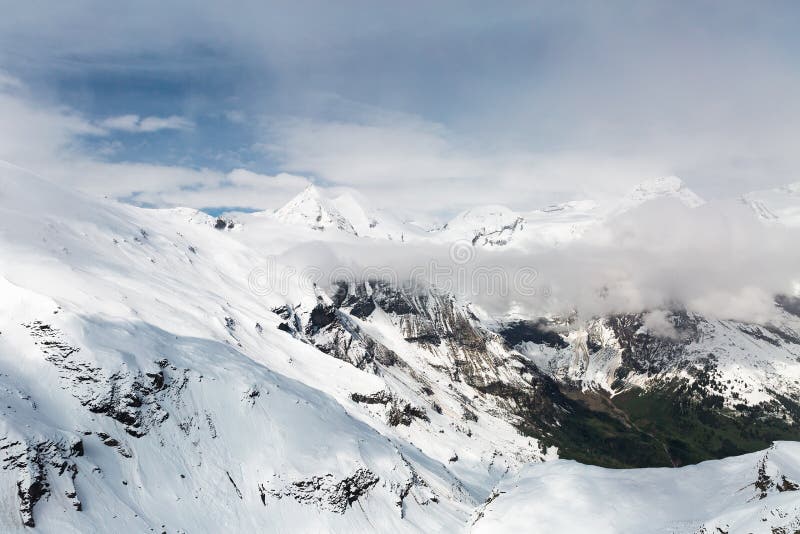 Snow-capped Alps stock image. Image of austria, mountain - 55471915