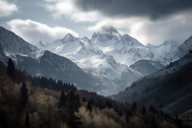 Snow-capped Mountain Range, with Clouds Gathering in the Distance Stock ...