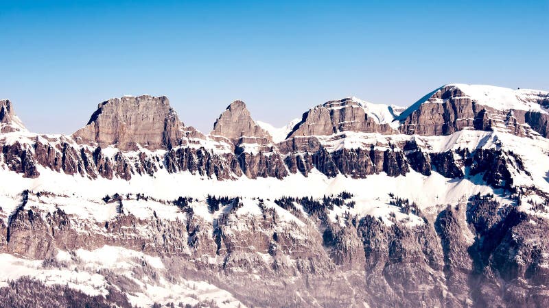 Snow - Capped Mountain Ridge Under Clear Sky Stock Illustration ...