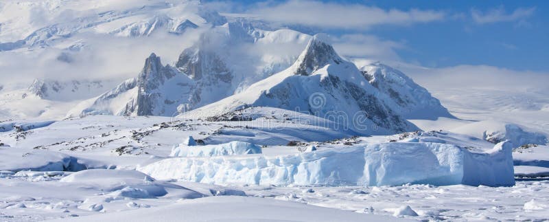 Snow-capped mountains stock image. Image of majestic - 17356859