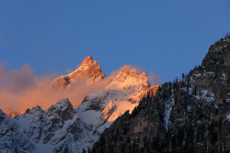 Snow Capped Tetons in Fall stock image. Image of mountains - 125039713