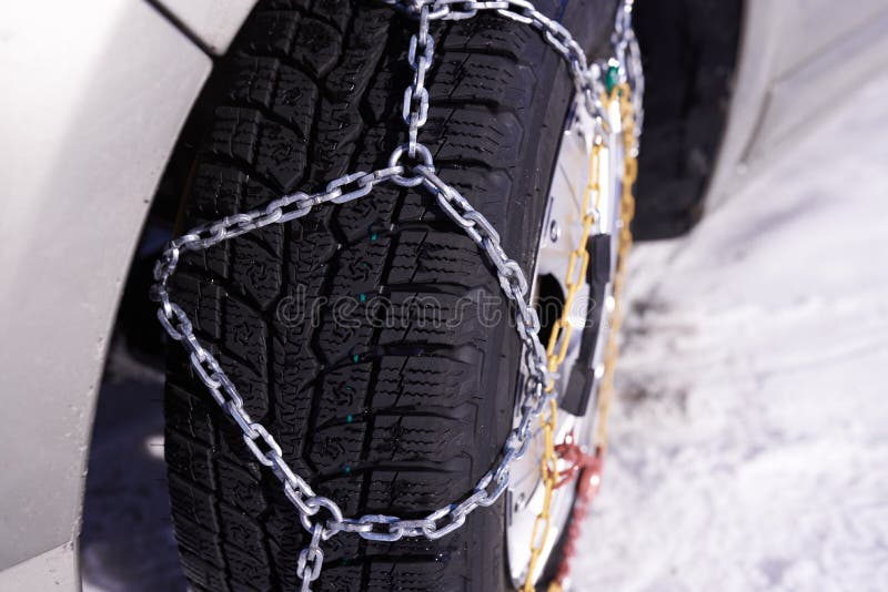 Snow Chain on a Wheel in Deep Snow in Winter Stock Image - Image of ...
