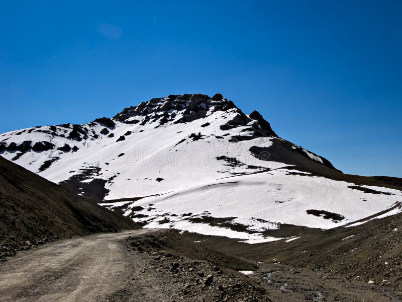 Snow clad mountain peaks stock image. Image of arrangement - 259026527