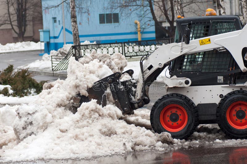 Snow Cleaning Machine on the Streets of the City Stock Photo - Image of ...