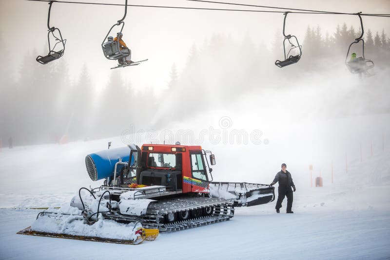 Snow Cleaning Machine Working on Ski Slope Under Cable Chairs Editorial ...