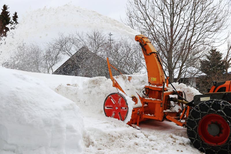 Snow Clearing Work with a Large Snow Blower in Winter Stock Photo ...