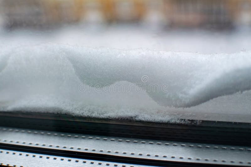 Snow Close-up Lies on the Windowsill Outside. Snow on the Windowsill in ...