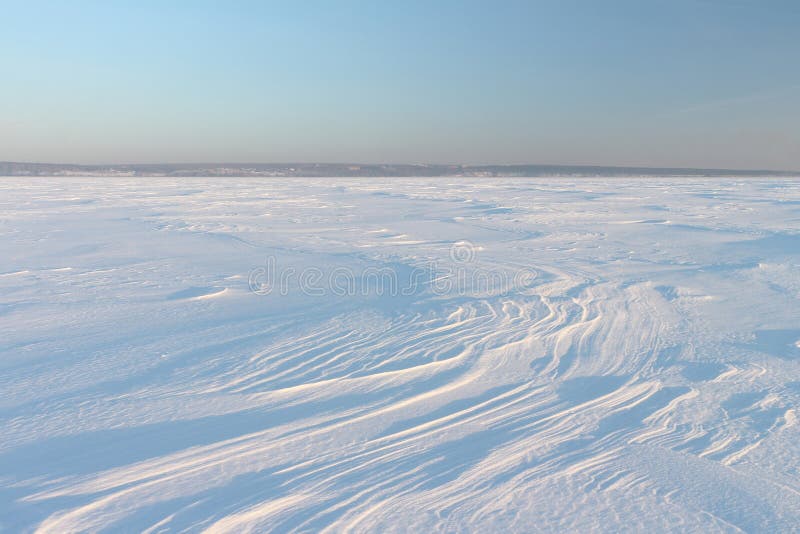 Snow Cover of a Freakish Form on Ice of the Frozen River Stock Photo ...