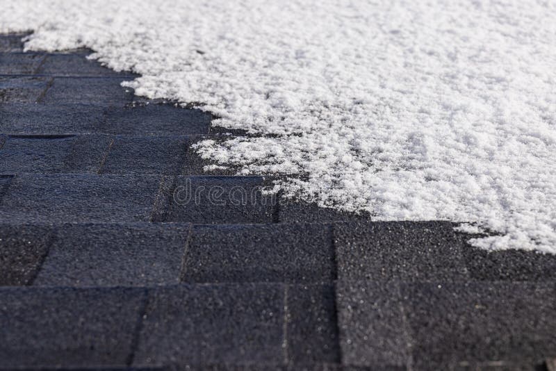 Snow-covered Asphalt Shingle Roof with Visible Patterns and Texture ...