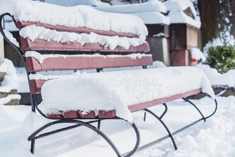 Snow covered bench stock image. Image of frosty, city - 131387035