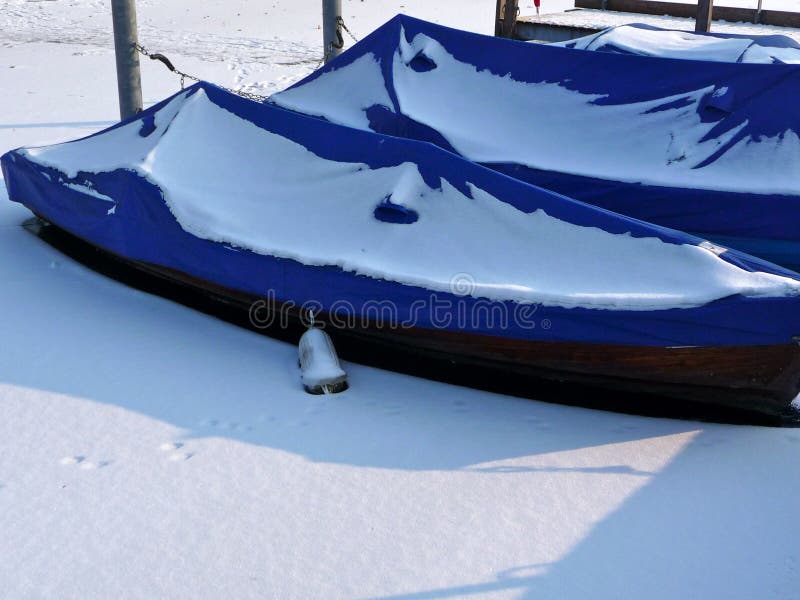 Covered boats on the wharf stock photo. Image of winter - 209313752