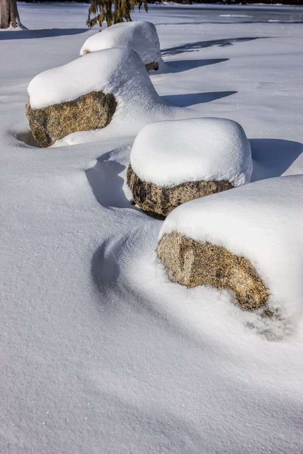Snow covered on boulders. stock photo. Image of landscape - 83547908