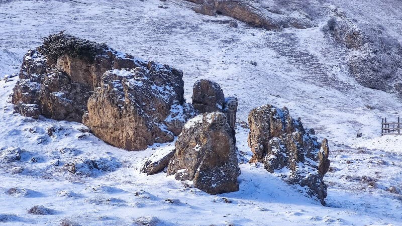 Snow-covered Boulders in a Mountainous Area. Stock Photo - Image of ...