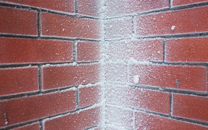 Snow Covered Brick Wall stock photo. Image of frame, covered - 49128150