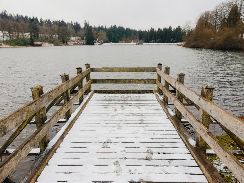 Snow-covered Bridge at Lake in Winter Landscape Stock Photo - Image of ...