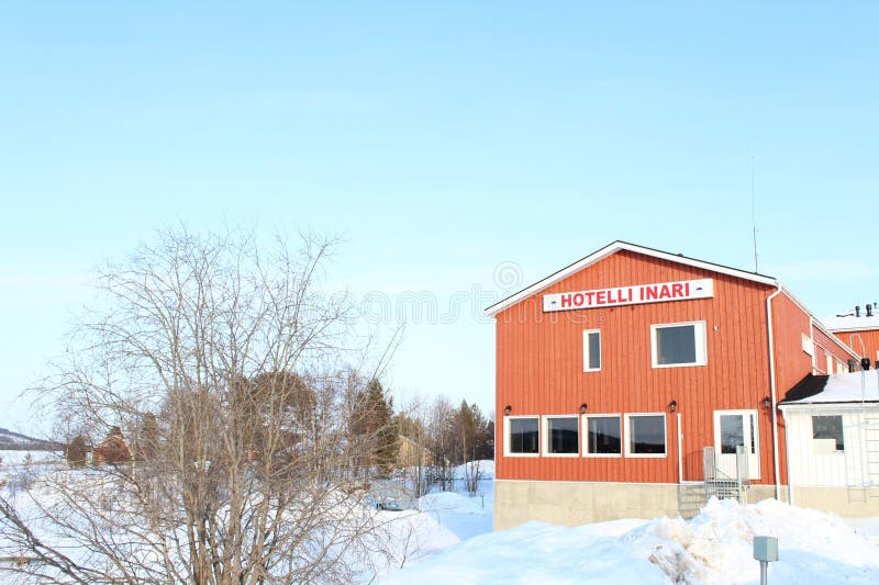 Snow-covered Building in Front of a Tree in a Winter Scene Editorial ...