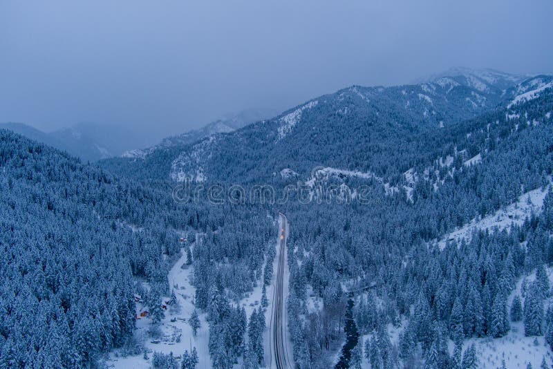 The Snow Covered Cascade Mountains at Twilight in Washington State ...