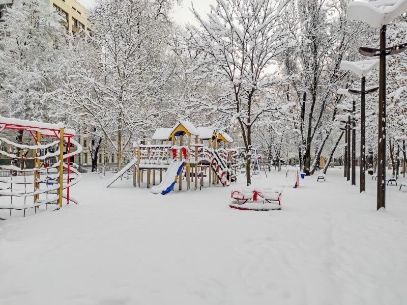 Snow Covered Childrens Playground Stock Image - Image of cold ...