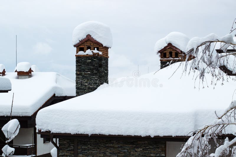Snow Covered Chimney and Roof Stock Image - Image of peaceful, resort ...