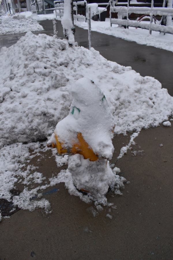 Snow covered fire hydrant stock image. Image of wall - 303330687