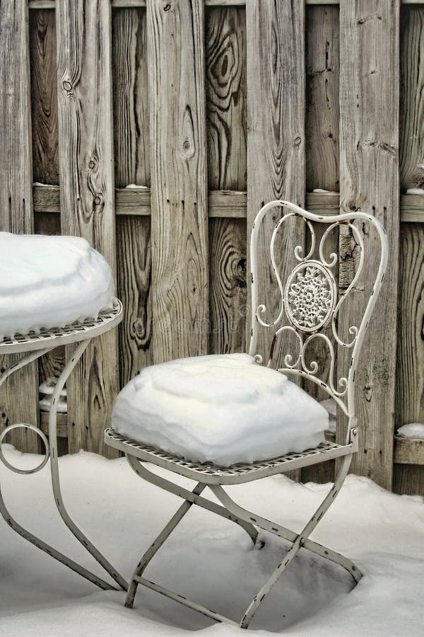 Snow Covered Garden Chair and Table Stock Image - Image of chair ...