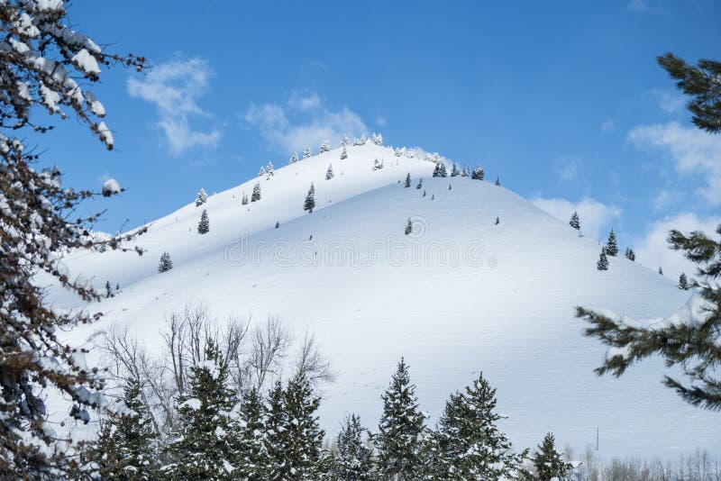 Snow Covered Hills on a Perfect Winter Day Stock Photo - Image of hills ...