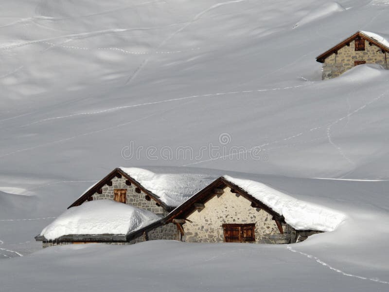 Snow covered huts stock image. Image of season, area - 28884591