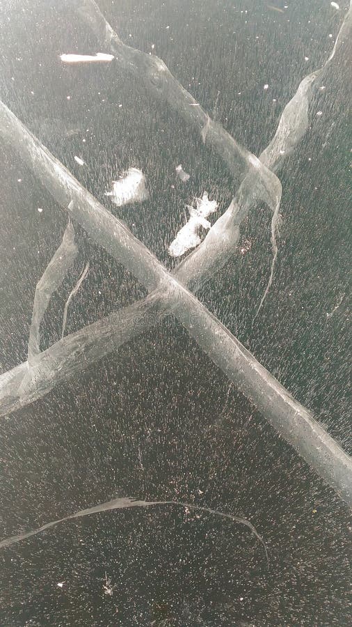 Snow Covered Ice Cracked Ground Texture Top View. Stock Photo - Image ...